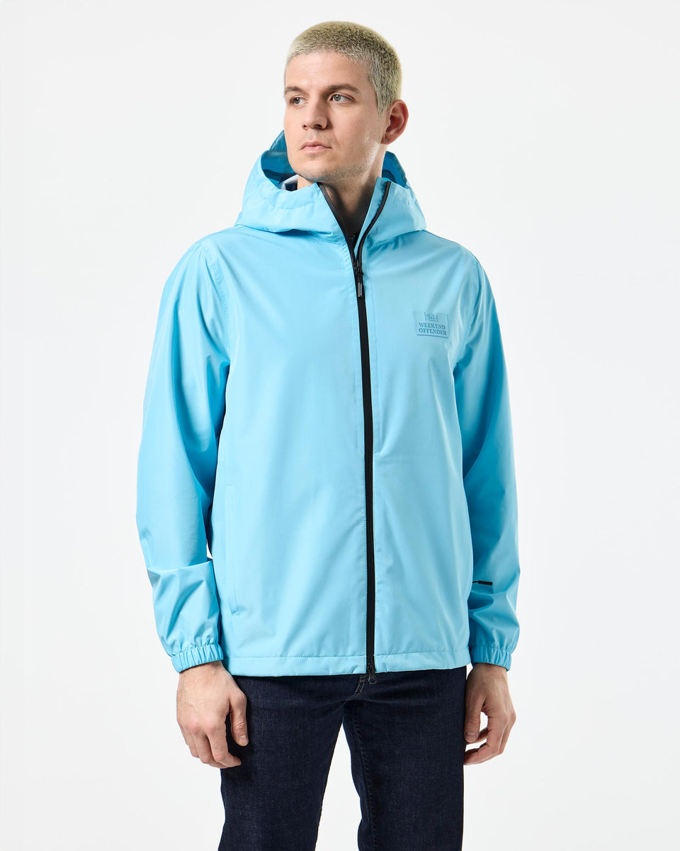 Football + Festivals Waterproof Pack Away Jacket Ocean Wave Blue ...